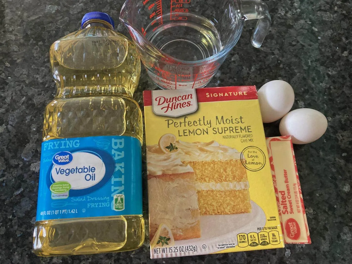 Triple Lemon Poke Cake - Out of the Box Baking